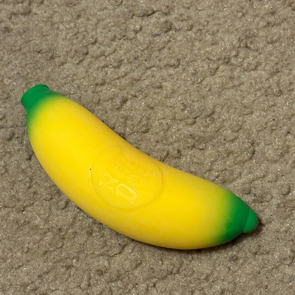 Toys | Nwot Needoh Green And Yellow Banana Stressfidget Toy | Poshmark